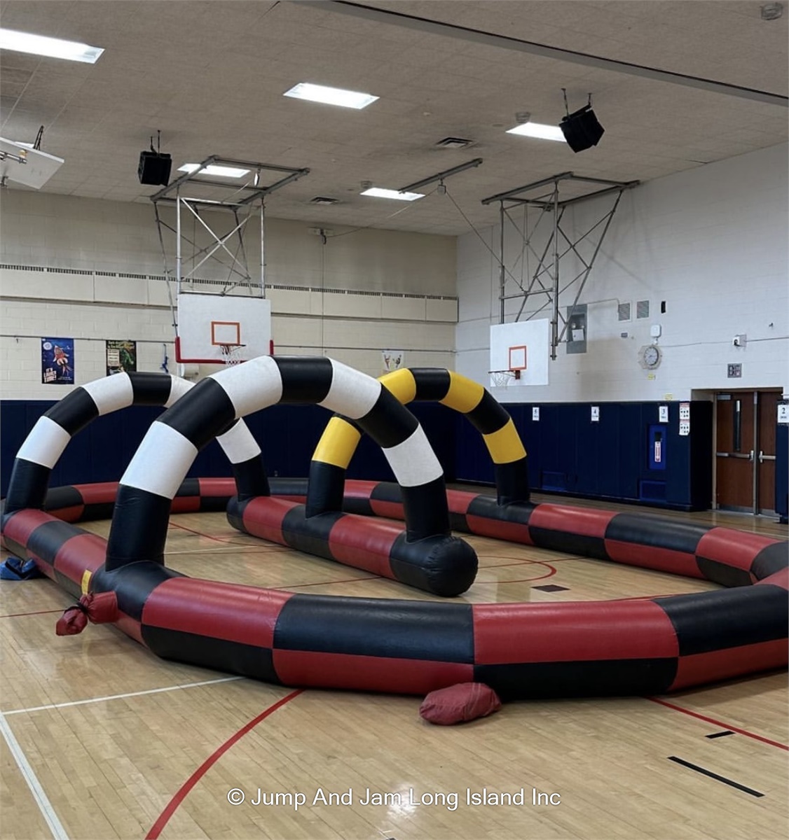 INT - Race track with jumbo adult/teen tricycles - Bounce House Rental ...